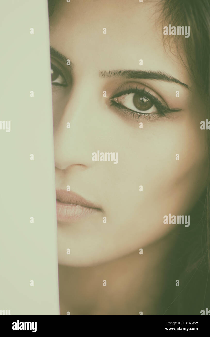 Peering eyes hi-res stock photography and images - Alamy