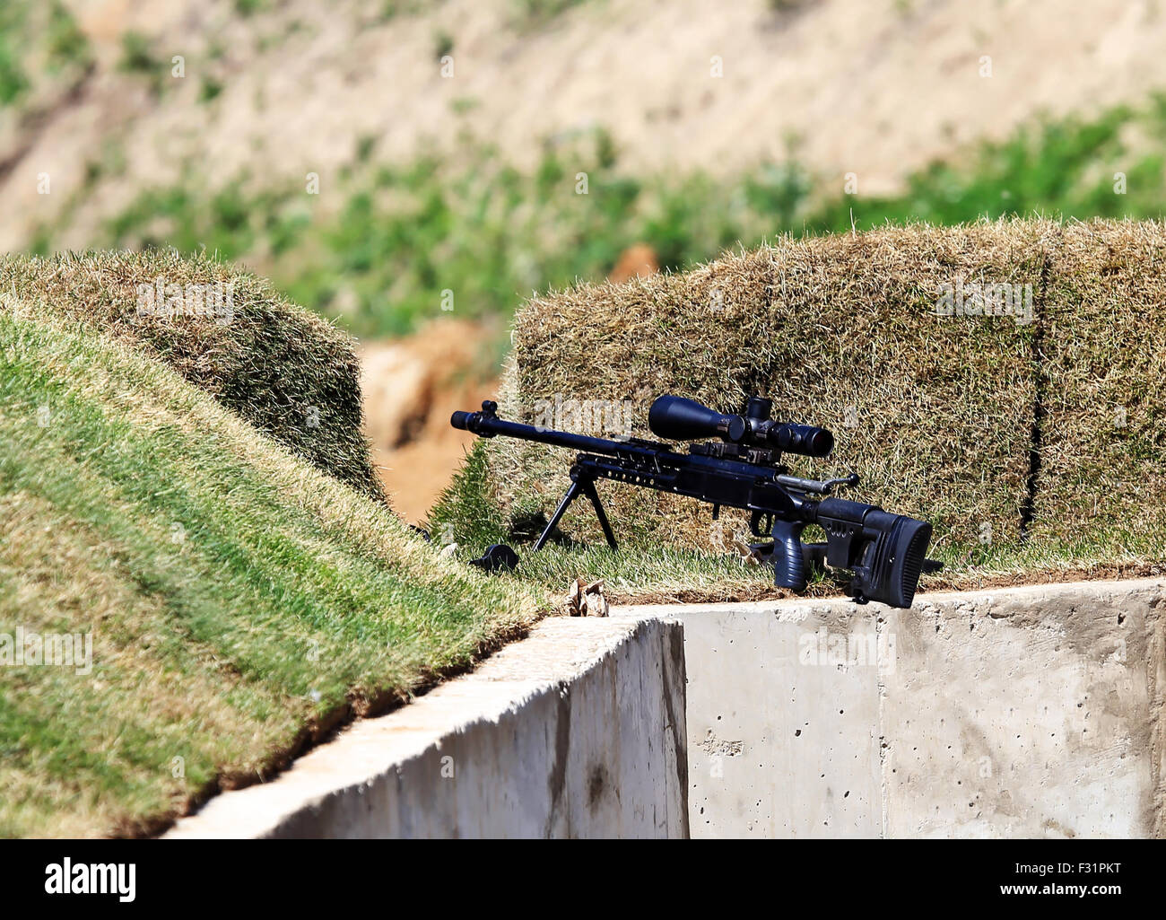 Automatic gun mounted on bipod on the parapet of the trench Stock Photo ...