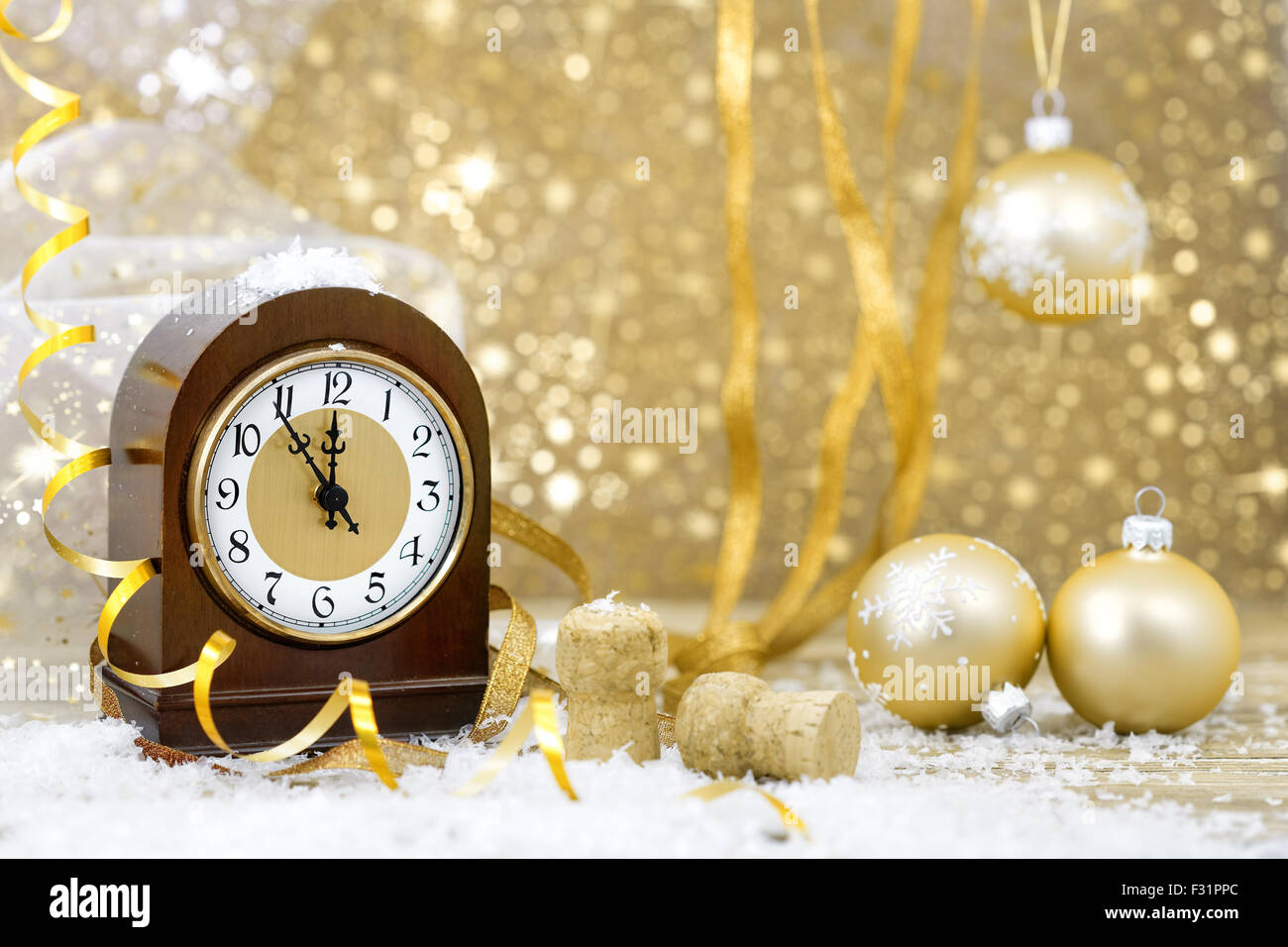 Happy New Year. Old clock on yellow abstract background Stock Photo - Alamy