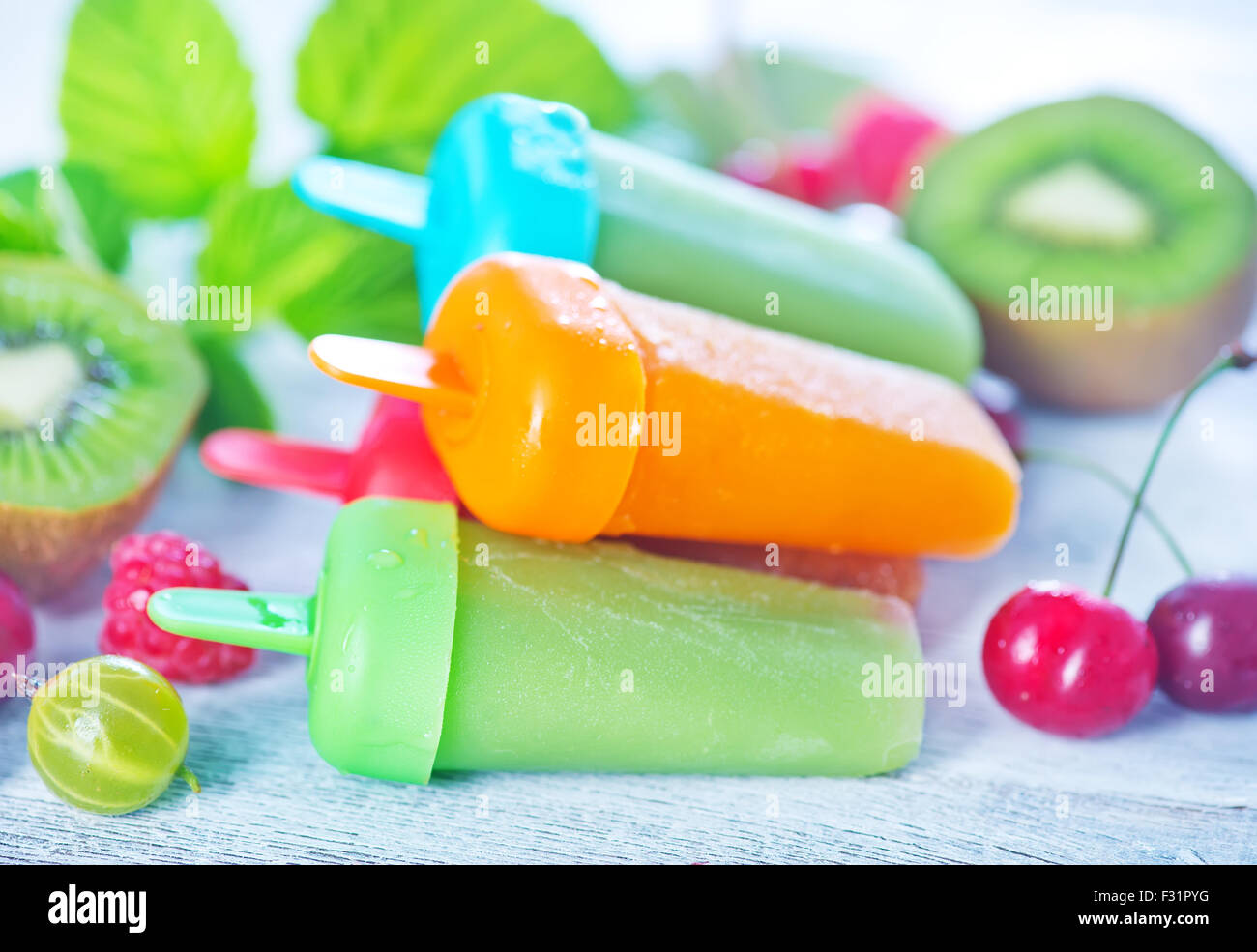 fruit ice cream on metal tray and on a table Stock Photo - Alamy
