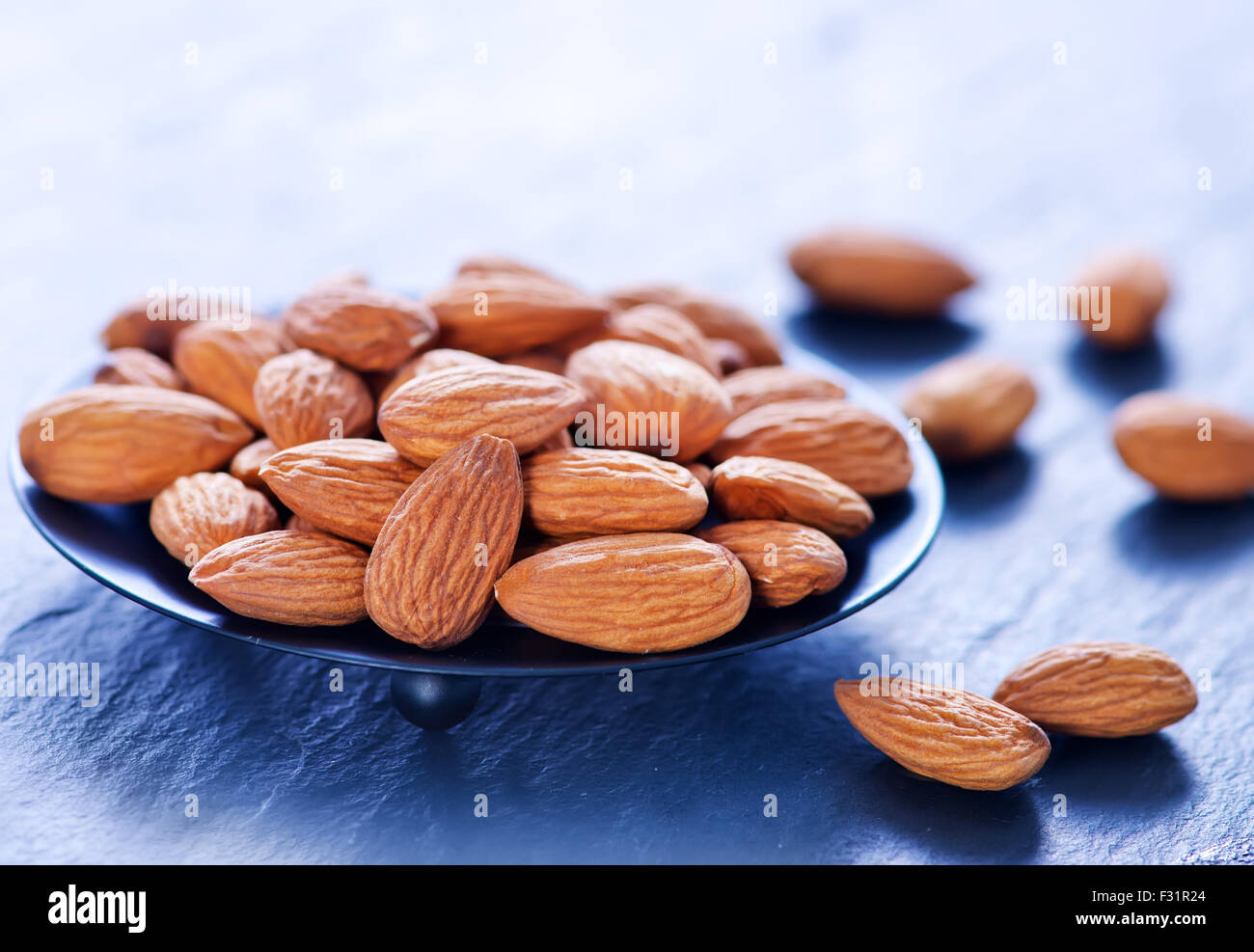 almond without shell on the wooden table Stock Photo - Alamy