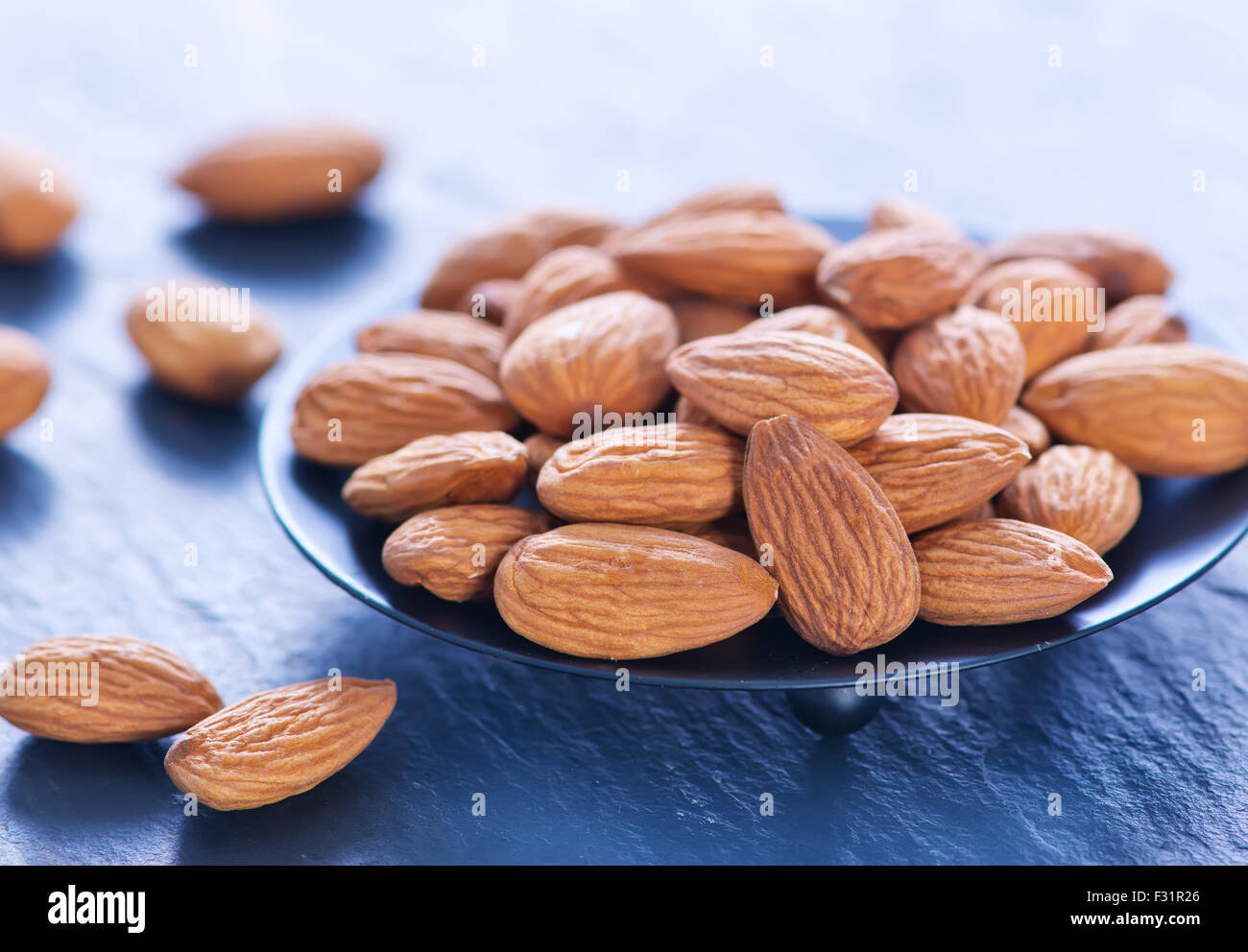 almond without shell on the wooden table Stock Photo - Alamy