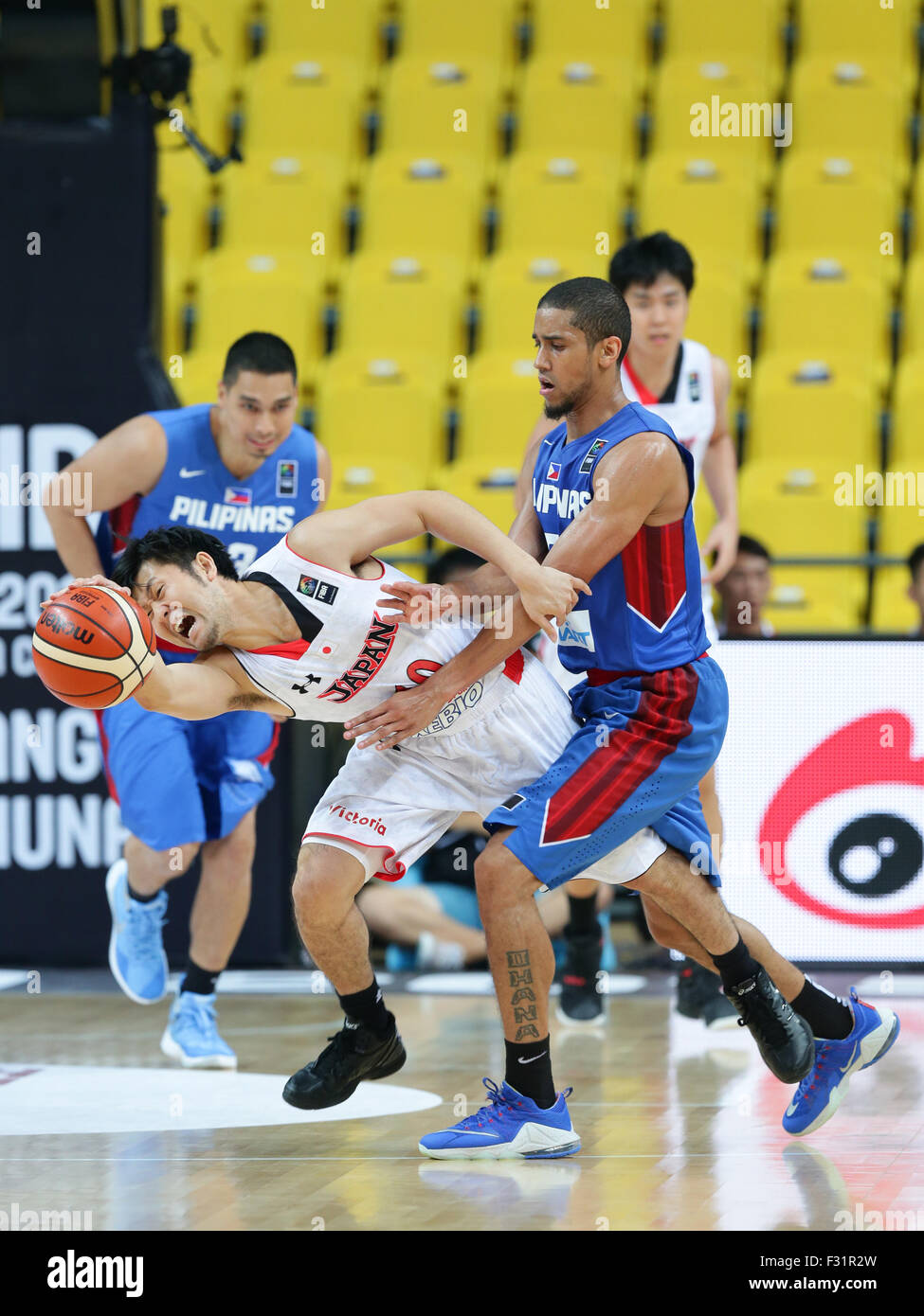 Changsha, China. 27th Sep, 2015. Ryoma Hashimoto (JPN), Gabriel Norwood (PHI) Basketball : 2015 ...
