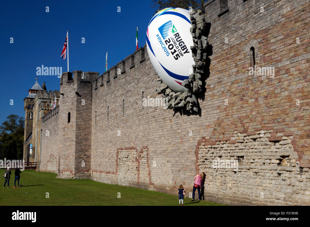 Giant rugby ball crashed into the wall of Cardiff Castle to mark the ...