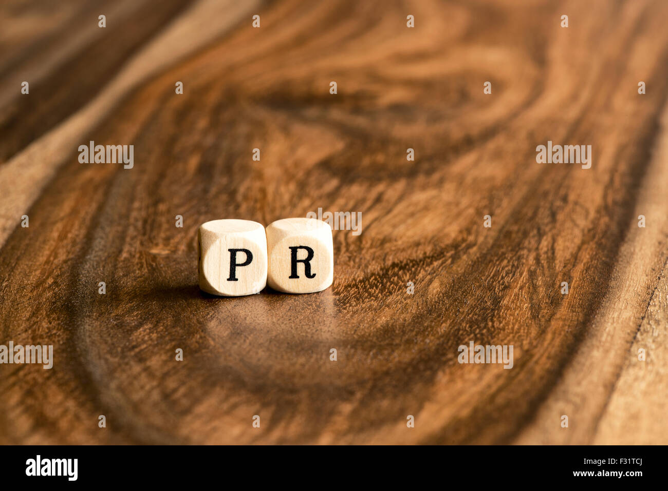 PR word background on wood blocks Stock Photo - Alamy