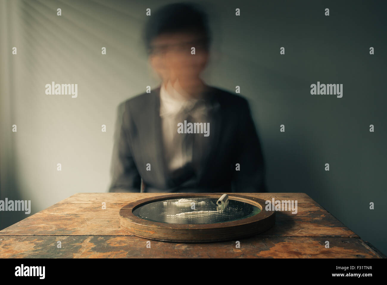Young businessman is shaking after getting high on cocaine Stock Photo ...