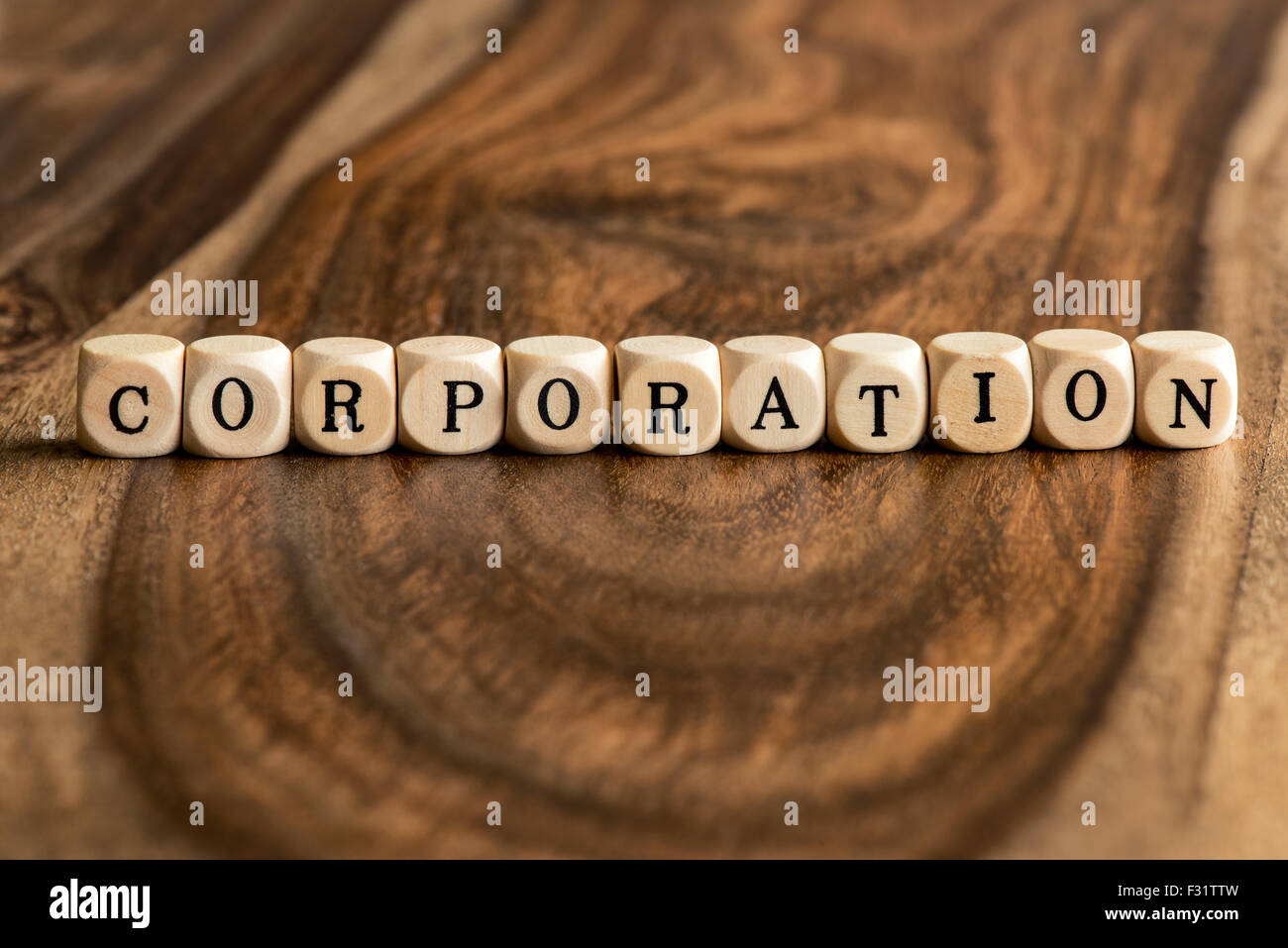 CORPORATION word background on wood blocks Stock Photo - Alamy