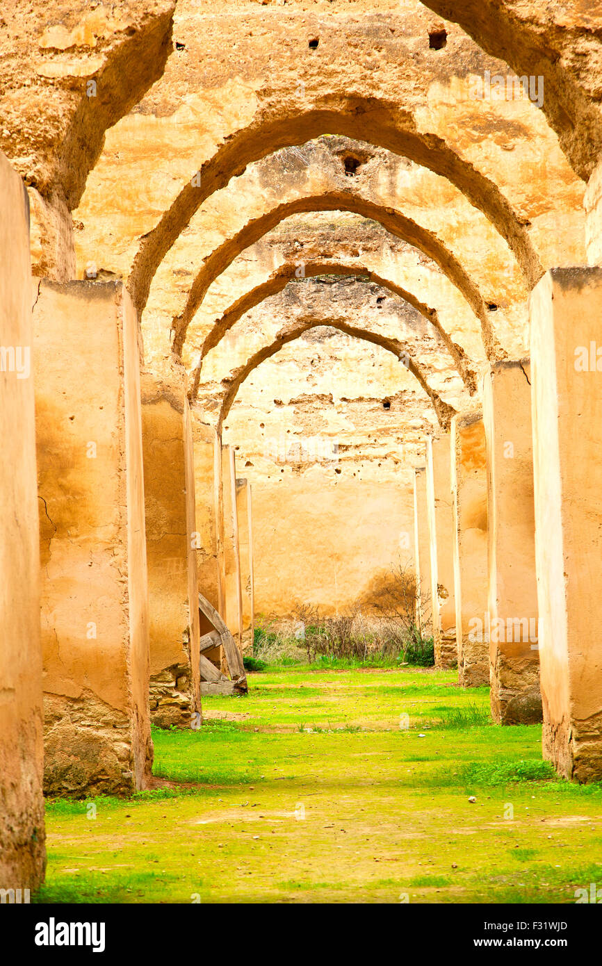 old moroccan granary in the green grass and archway wall Stock Photo ...