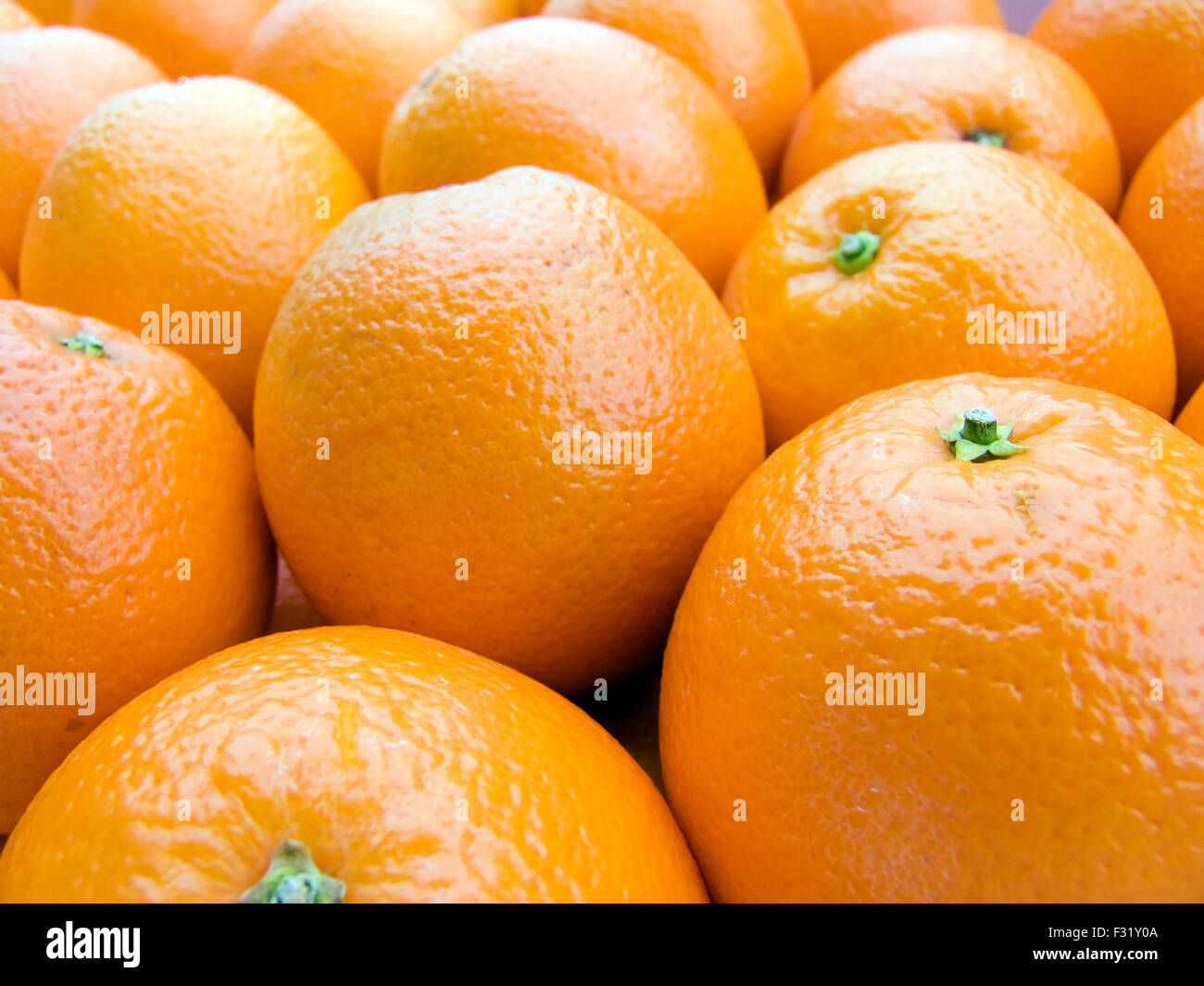 The beautiful oranges on a counter, fruit background close up Stock ...