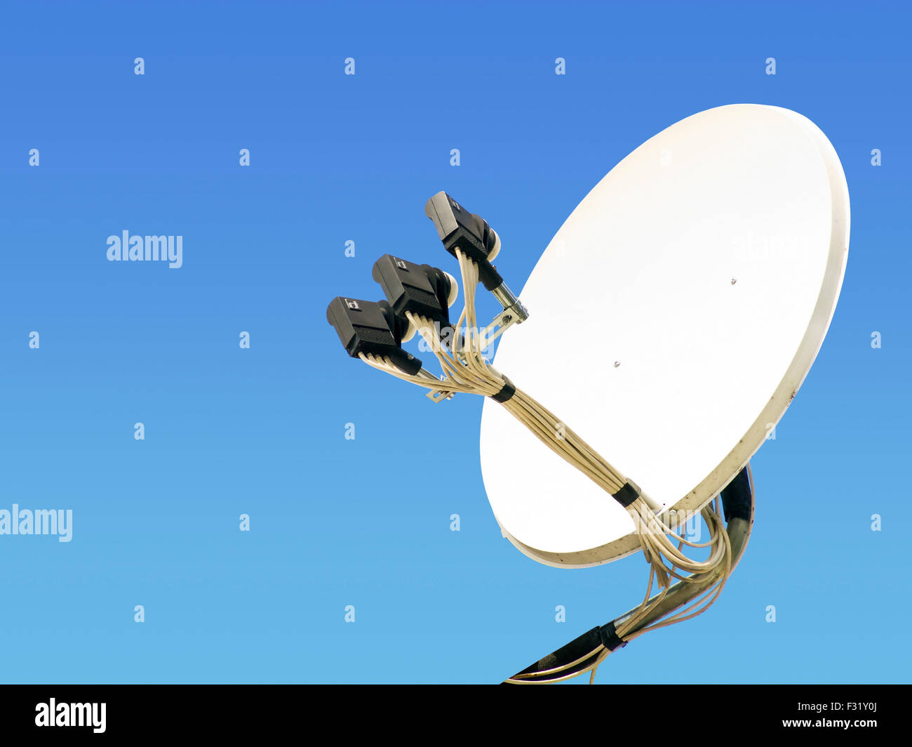 small satellite antenna on the blue sky background Stock Photo - Alamy