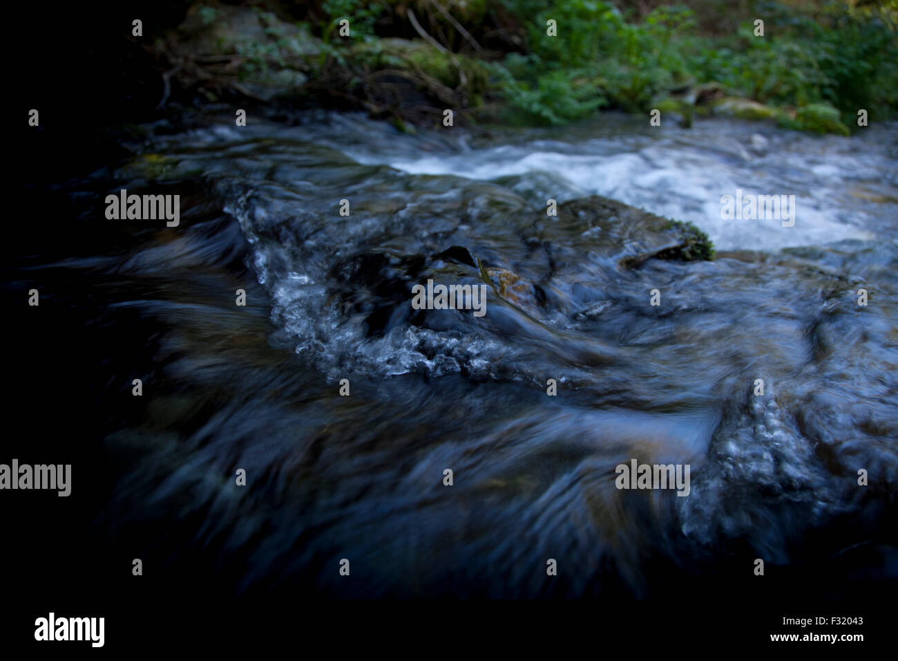 Rushing river landscape Stock Photo - Alamy
