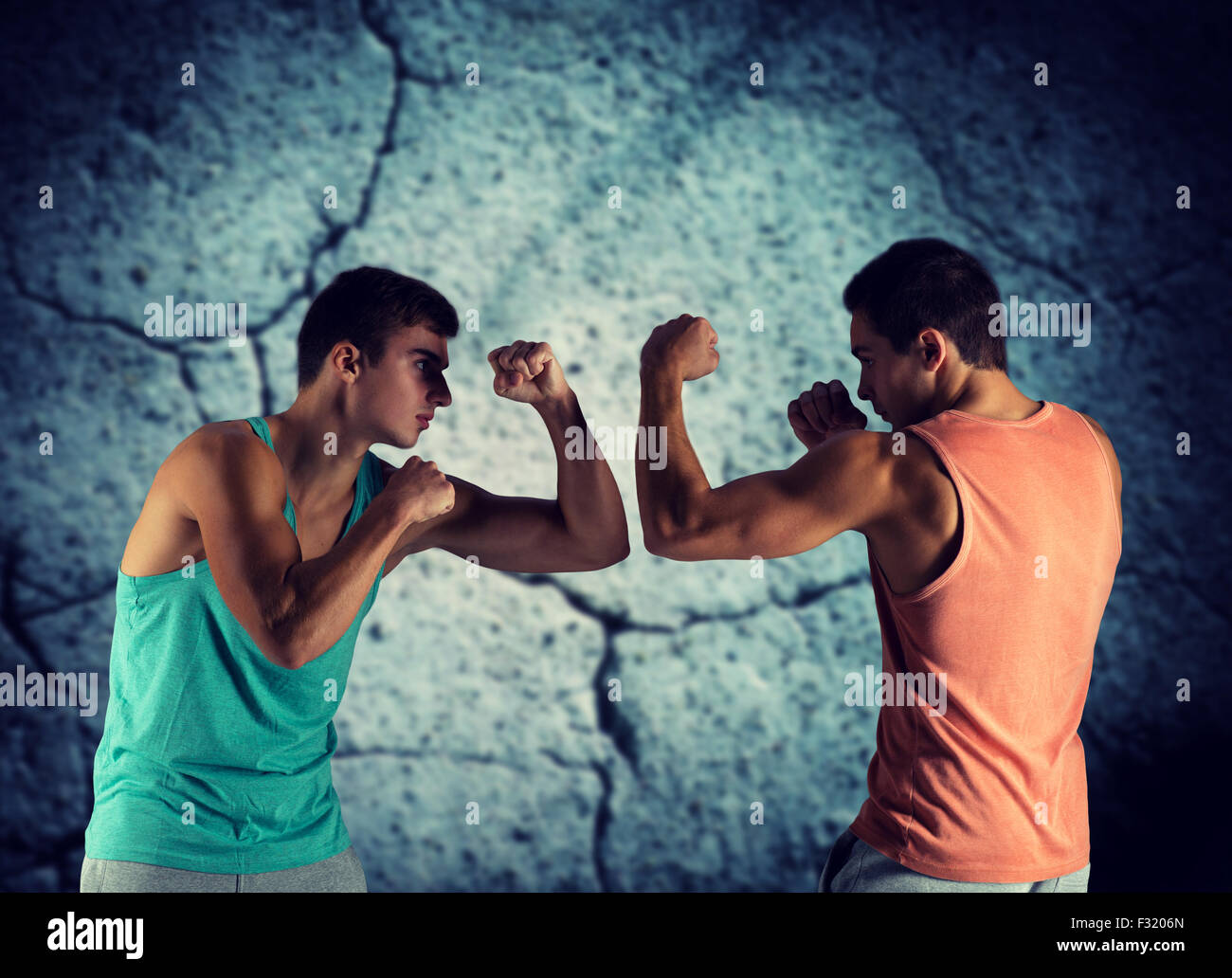 young men fighting hand-to-hand Stock Photo - Alamy