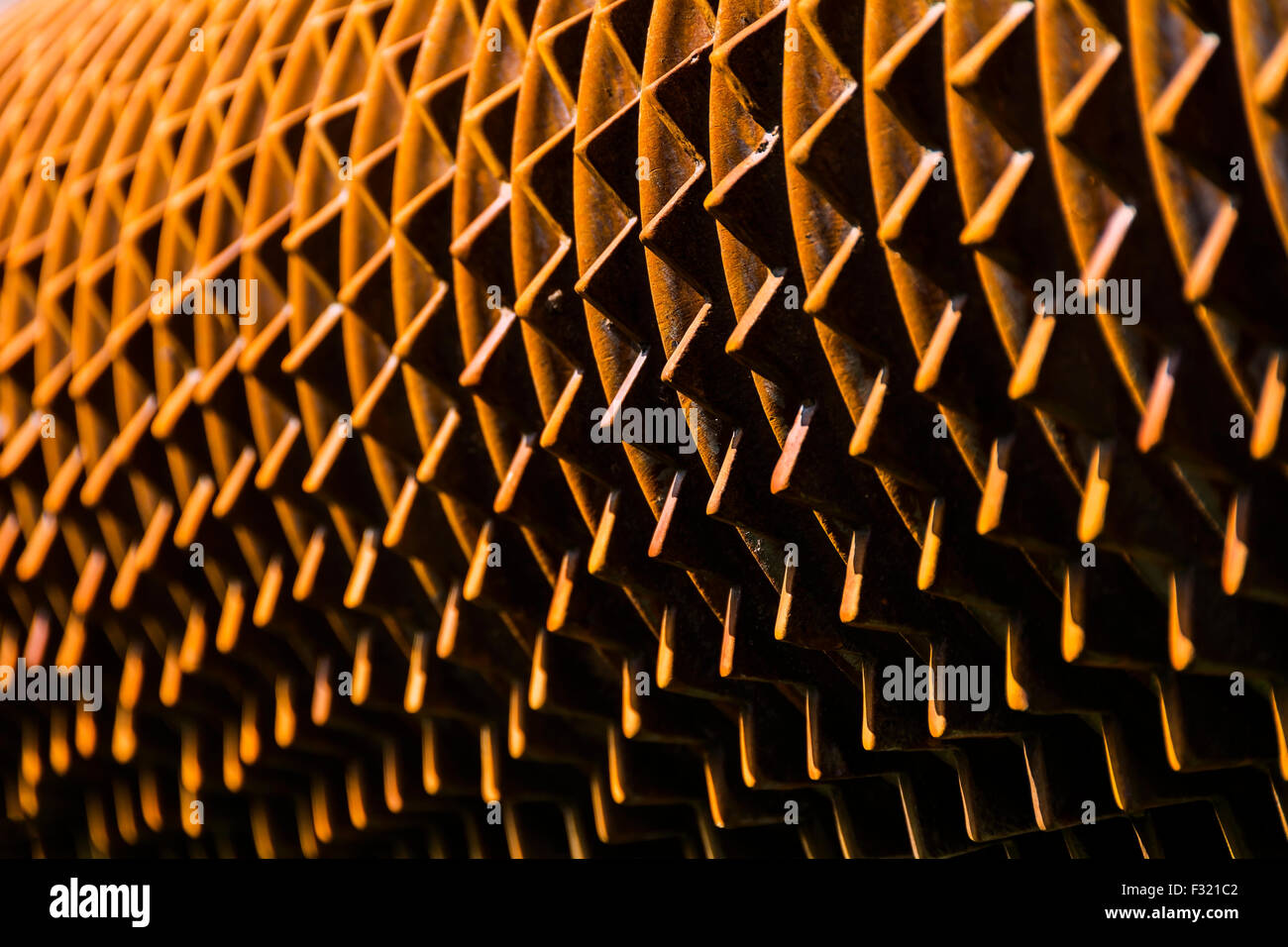 Triangular steel tines on a crumbler roller, commonly used to smooth ...