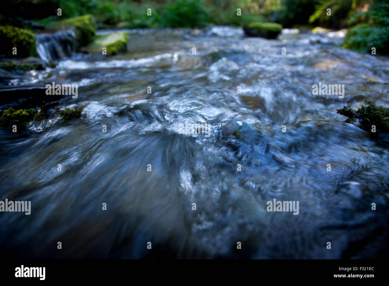 Rushing river landscape Stock Photo - Alamy