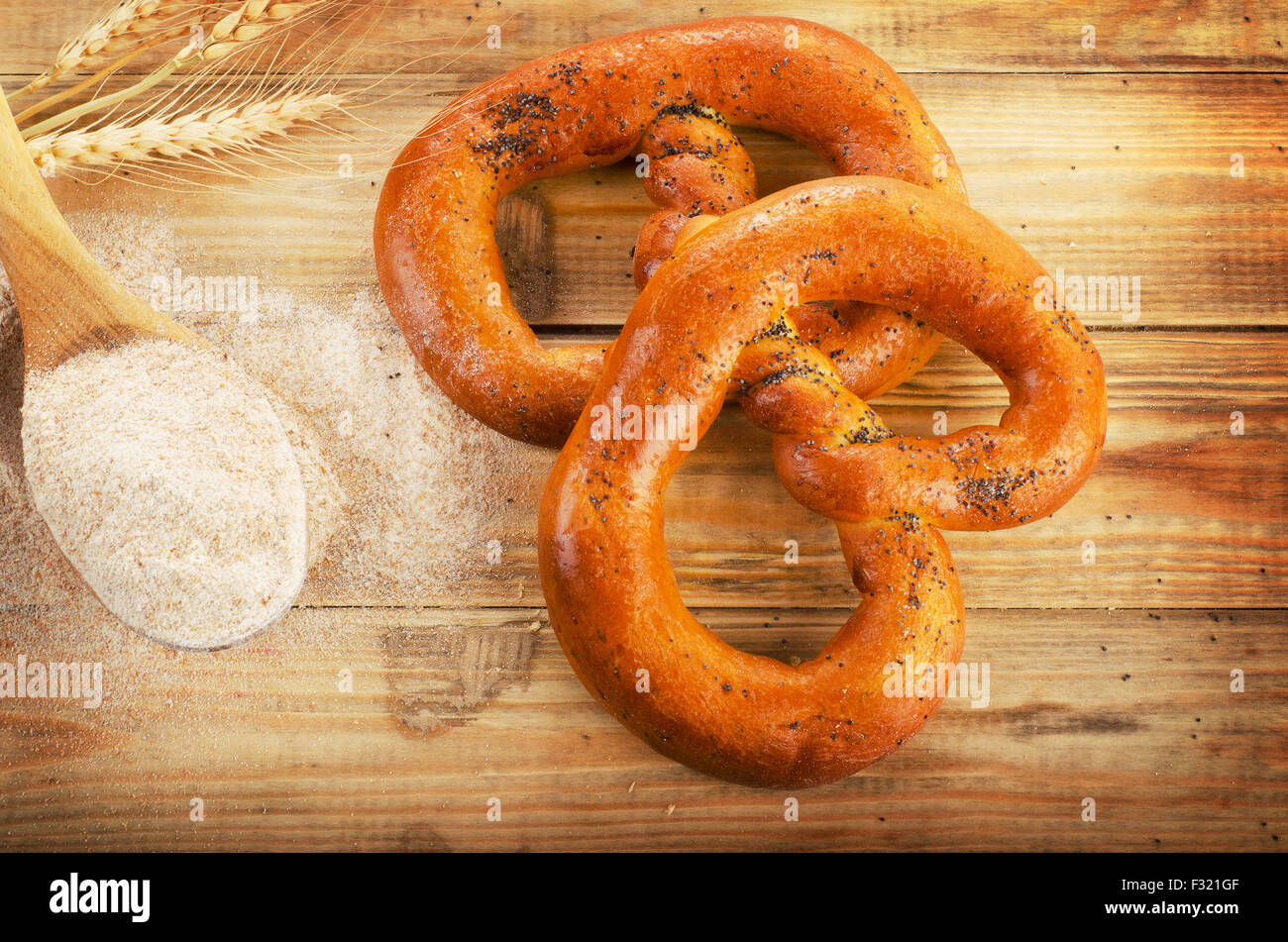 Pretzels on a old wooden table. Top view Stock Photo - Alamy