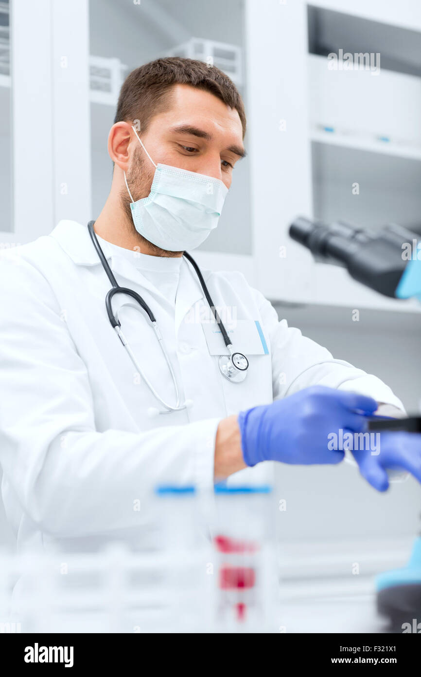 Lab worker in white gloves hi-res stock photography and images - Alamy