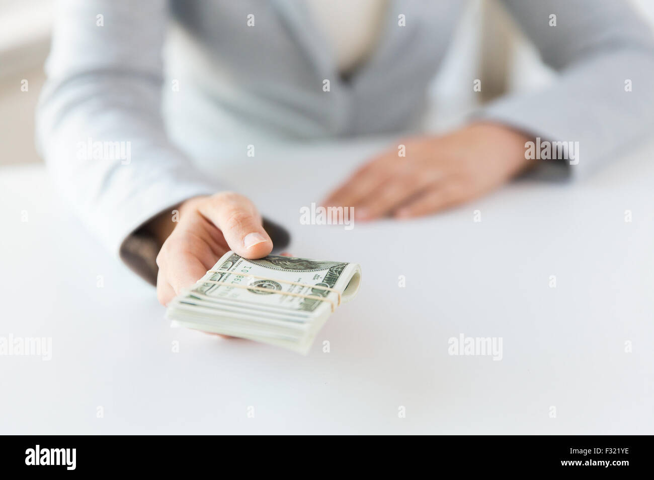 close up of woman hands holding us dollar money Stock Photo - Alamy