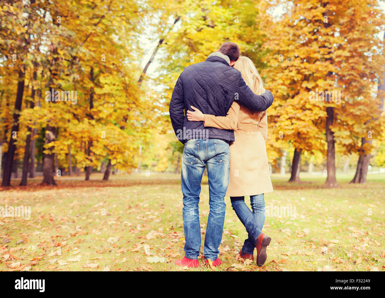 Woman hugging man from back hi-res stock photography and images - Alamy