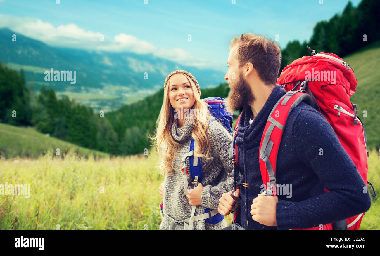 Teamwork travelers man woman backpacks hi-res stock photography and ...