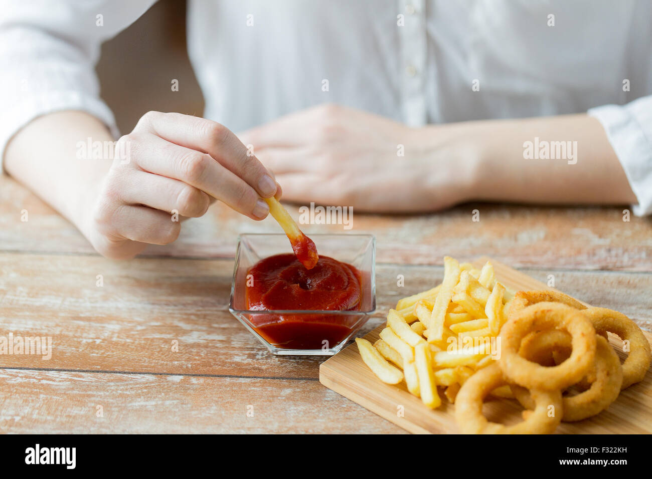 French fries human hi-res stock photography and images - Alamy