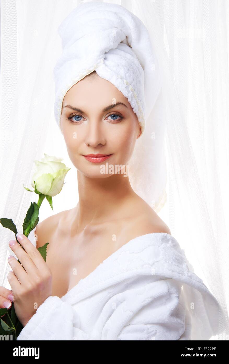 Beautiful woman with white rose Stock Photo - Alamy