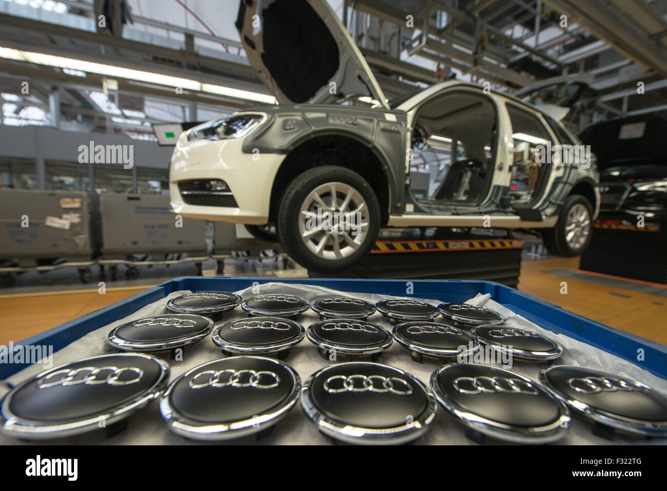 Audi emblems are ready to be mounted onto Audi A3's on the production ...