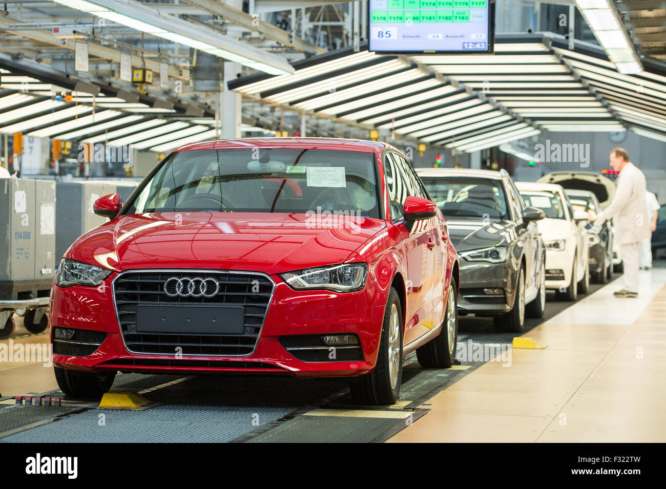 Employees of the Audi Factory check finished Audi A3's at the end of ...