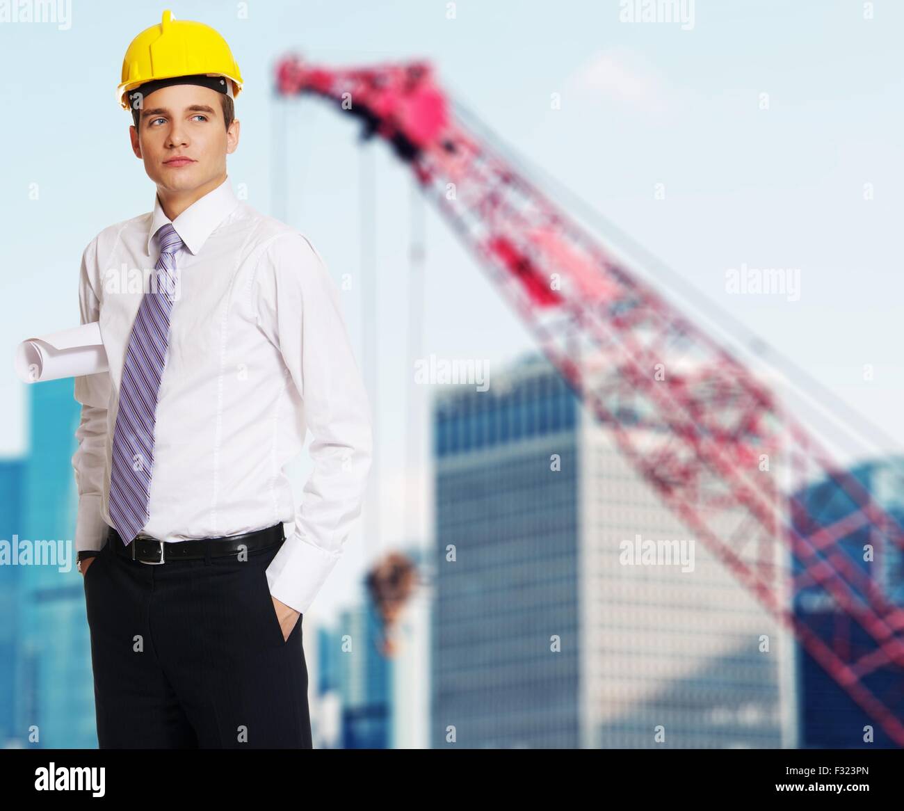 Young handsome builder Stock Photo - Alamy