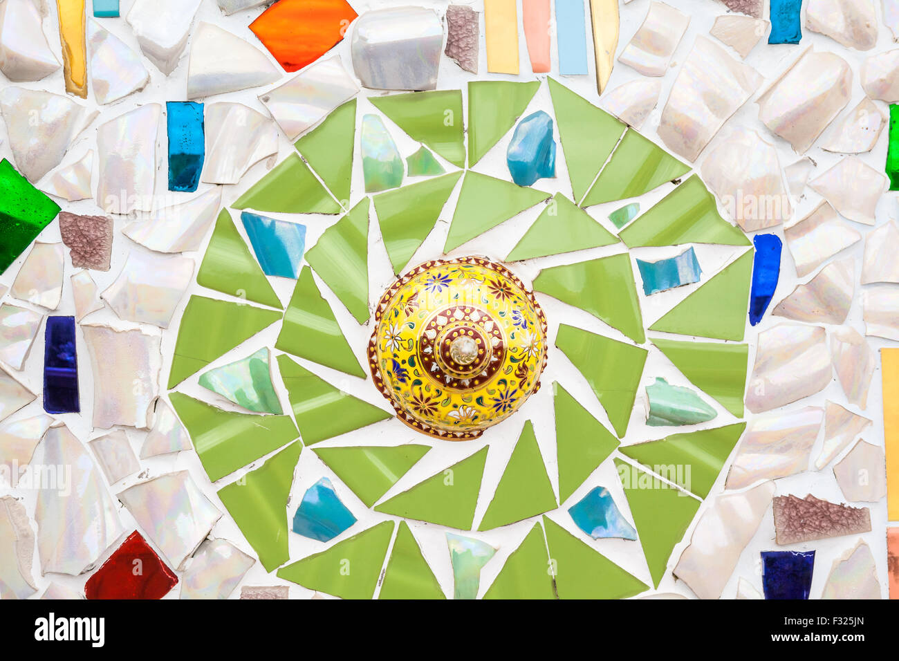 on this wall there are small pieces of tiles Stock Photo - Alamy