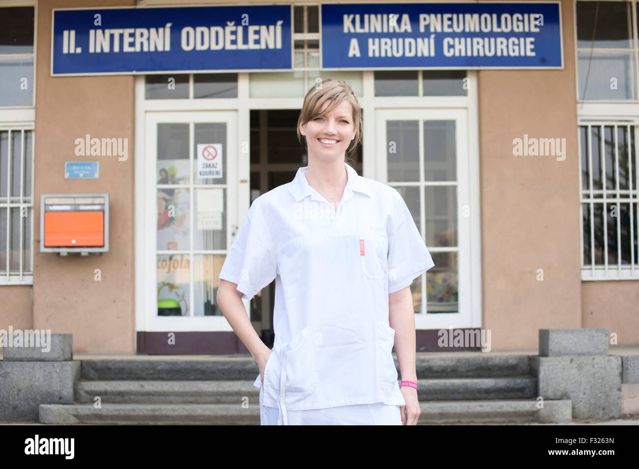 Smiling medical female doctor in Bulovka hospital in Prague, Czech ...