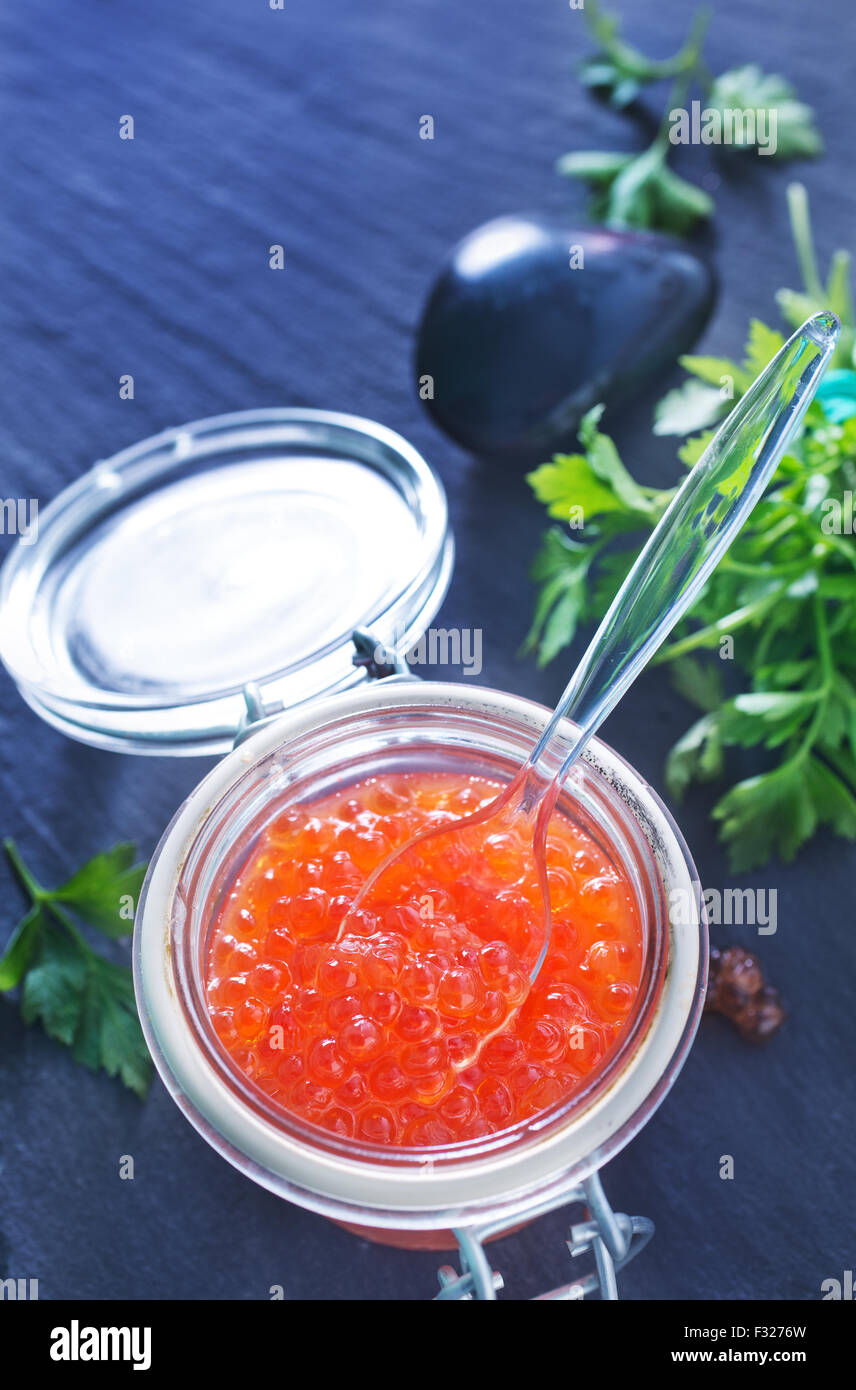 red salmon caviar in glass bank and on a table Stock Photo - Alamy