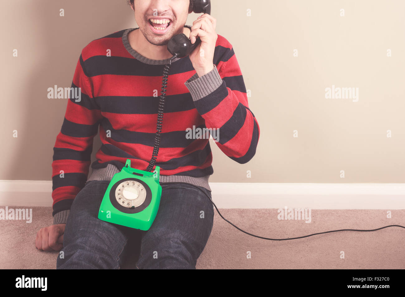 Happy man laughing conversation hi-res stock photography and images - Alamy