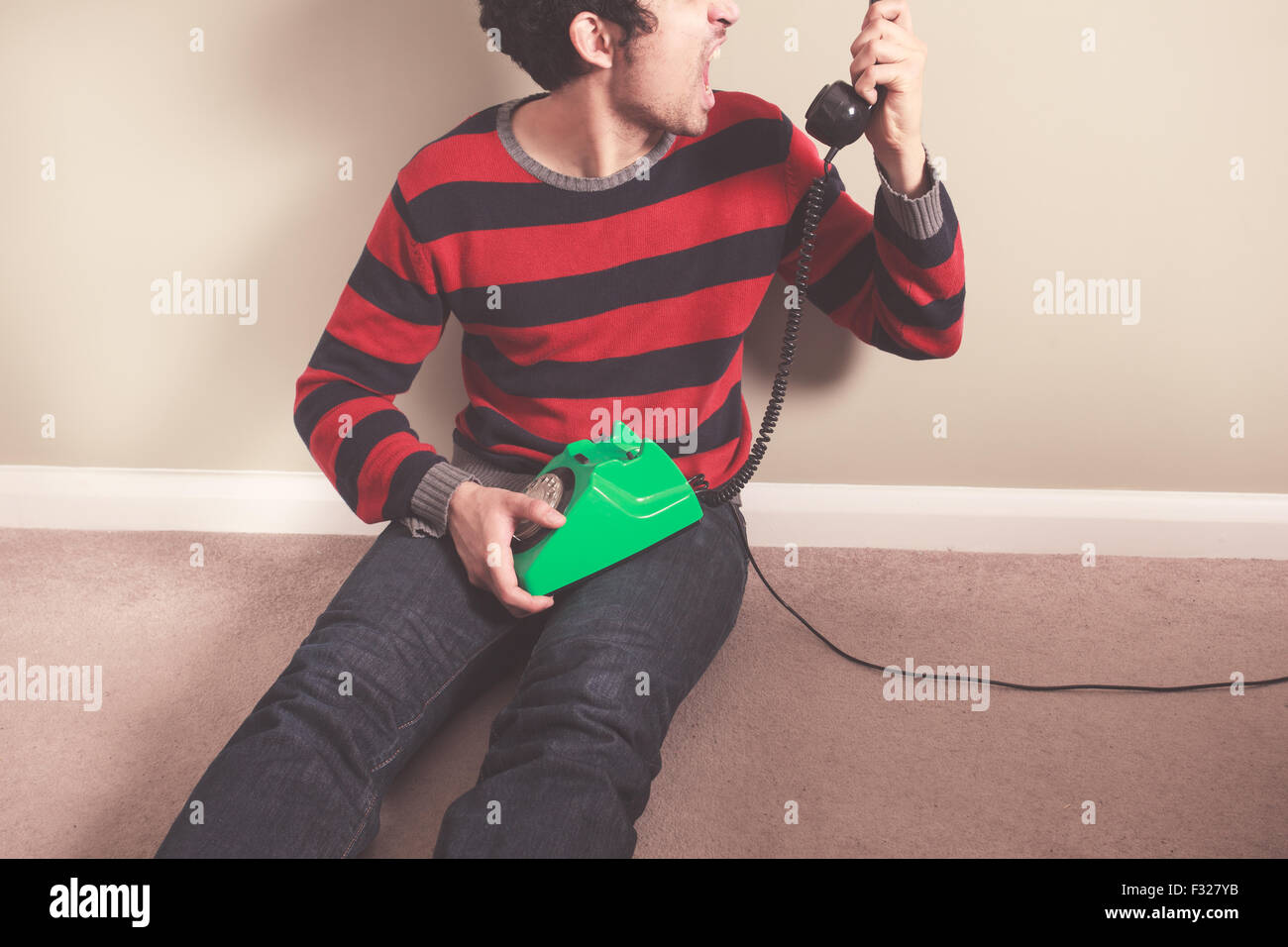 Angry man screaming phone hi-res stock photography and images - Alamy