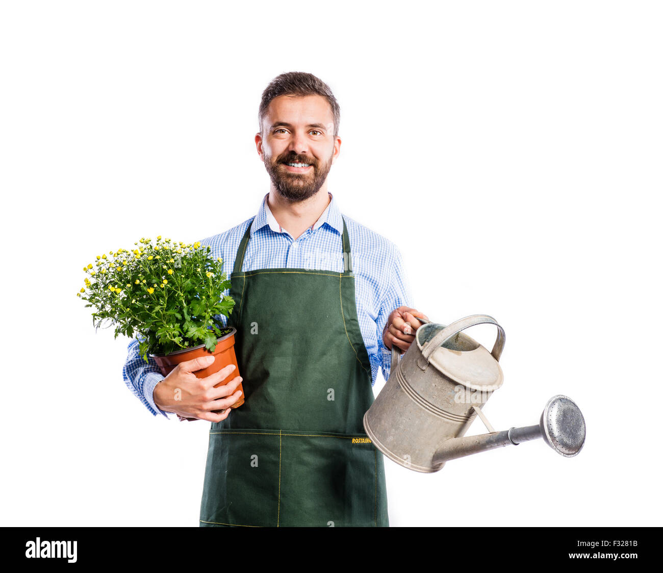 Young handsome gardener Stock Photo - Alamy