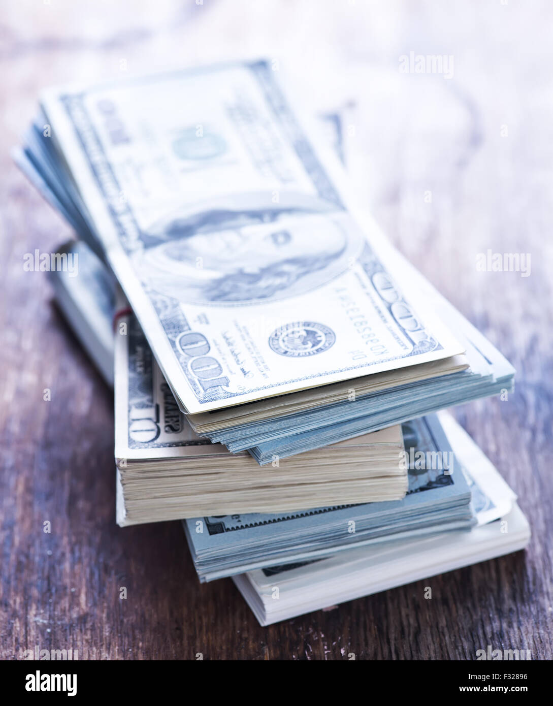 dollars on the wooden table, dollar background Stock Photo - Alamy