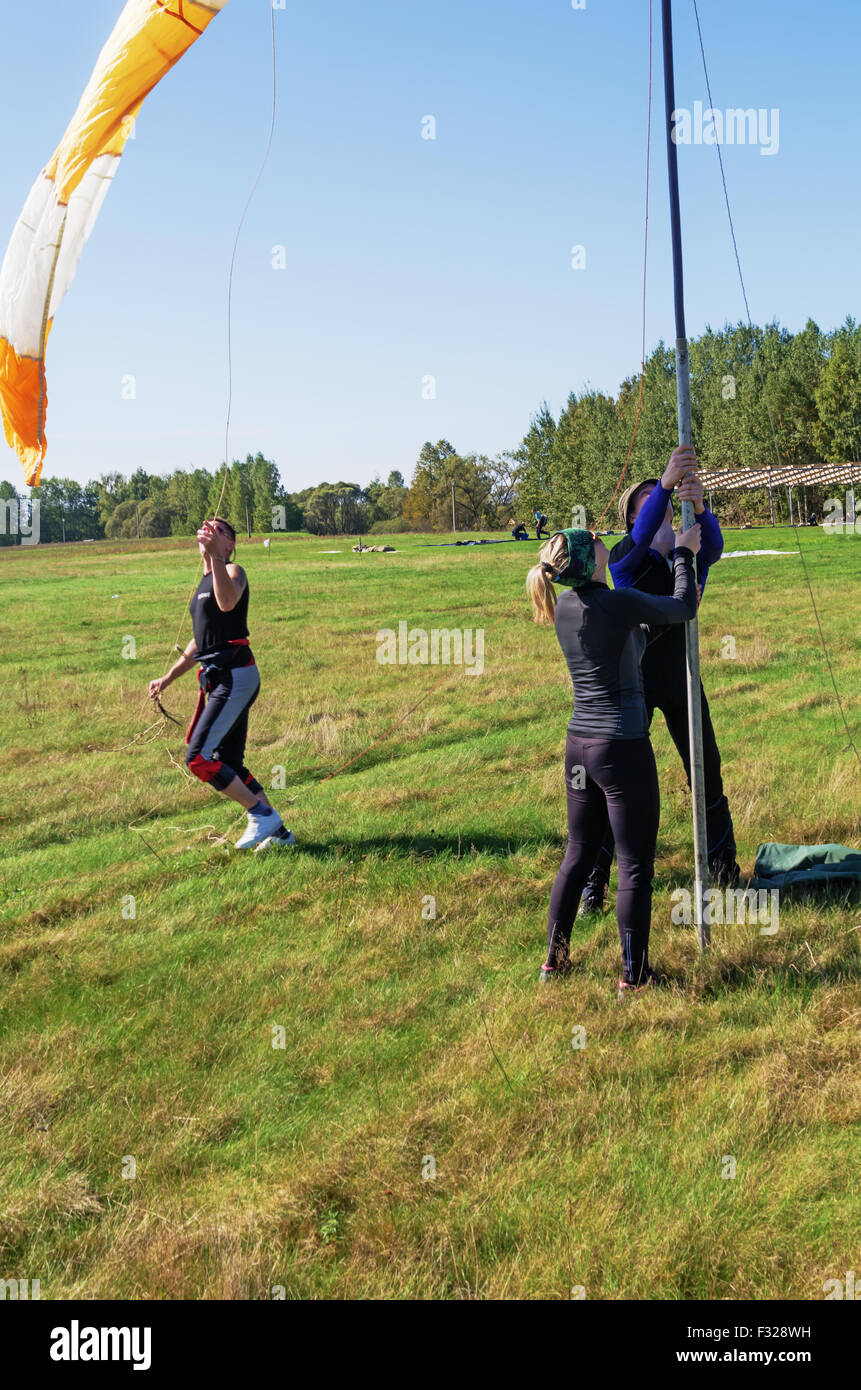 Parachutists - 2014. Assembly of a conical textile tube ( windsock) for ...