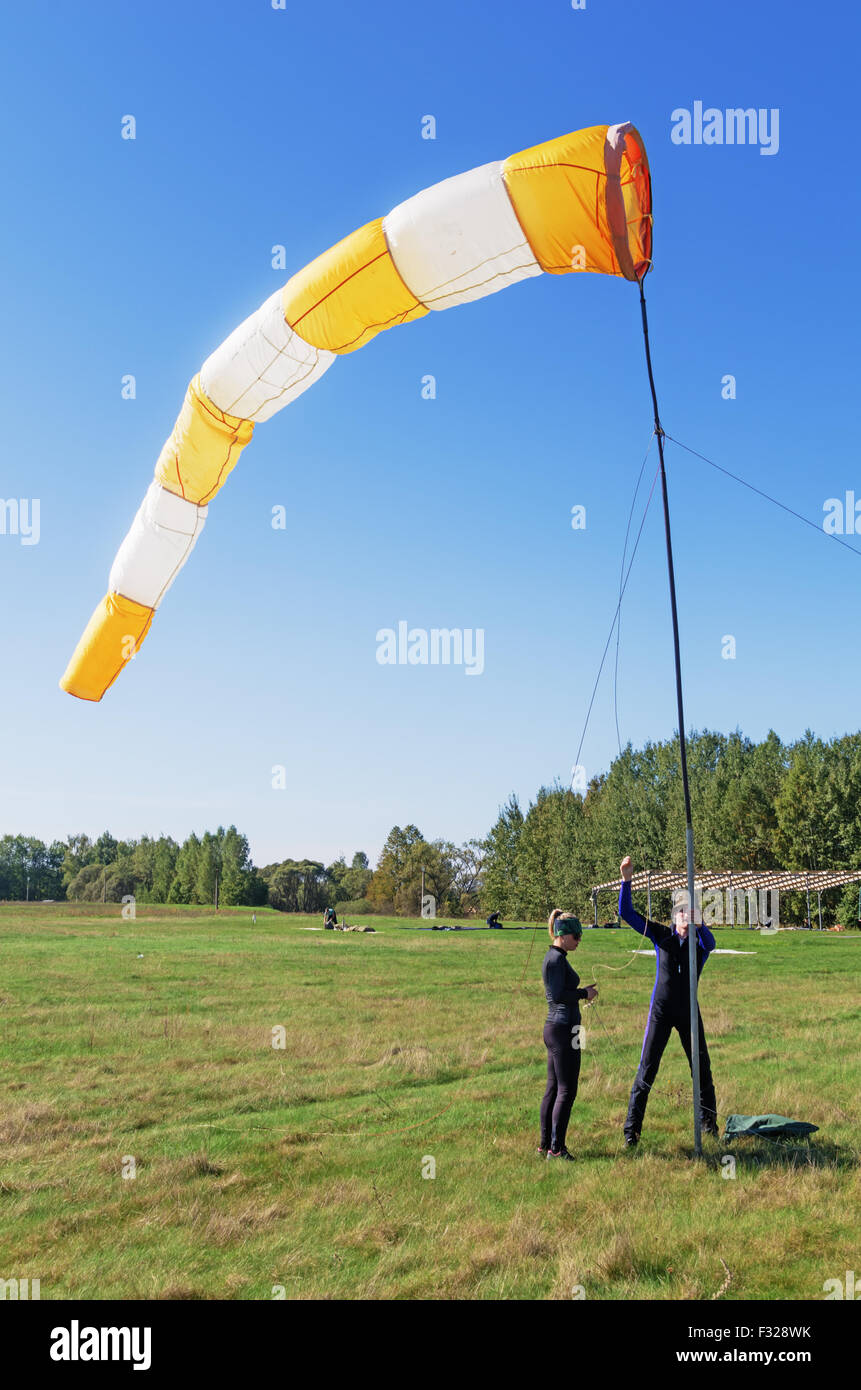 Parachutists - 2014. Assembly of a conical textile tube ( windsock) for ...