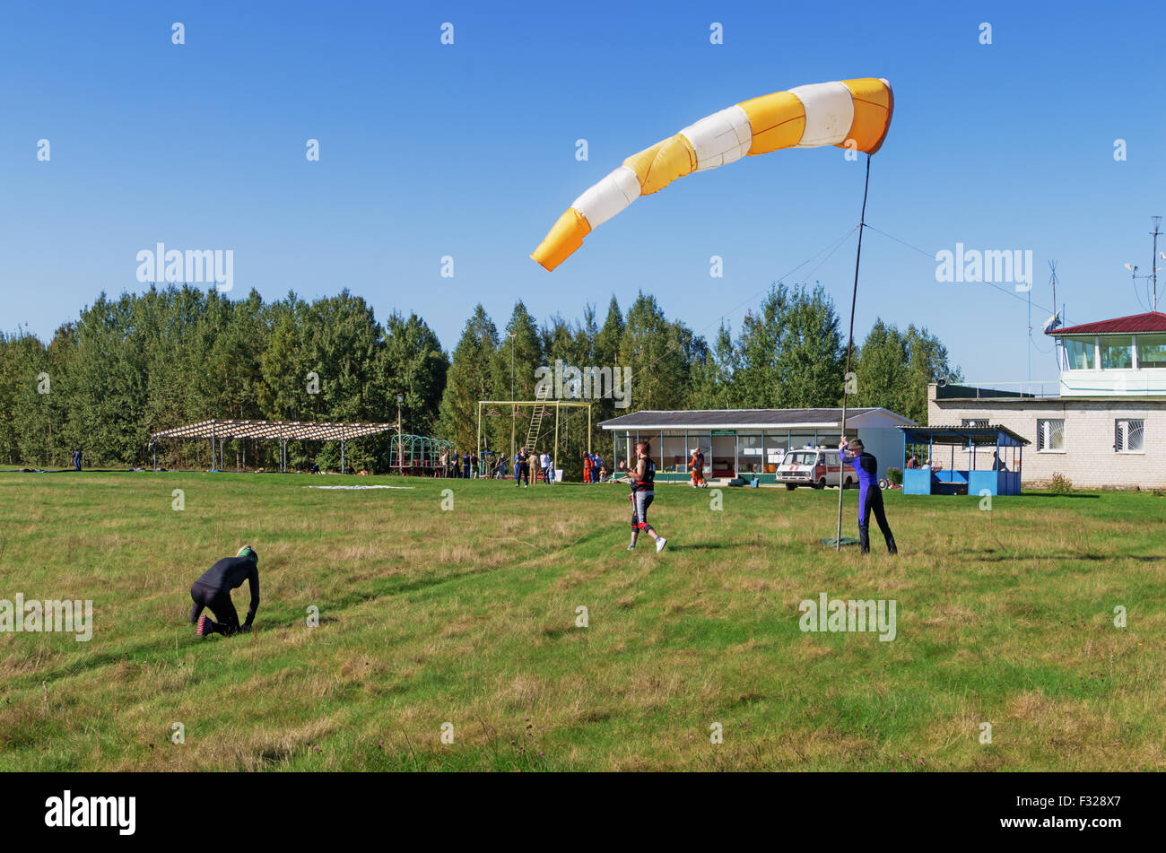 Parachutists - 2014. Assembly of a conical textile tube ( windsock) for ...
