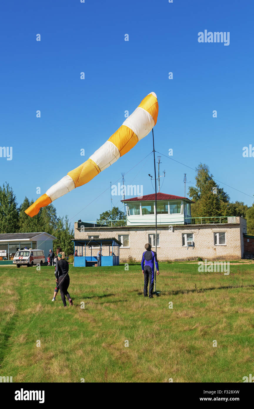 Parachutists - 2014. Assembly of a conical textile tube ( windsock) for ...
