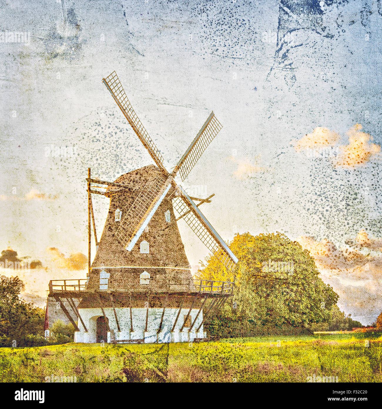 Vintage print styled image of old windmill Stock Photo - Alamy