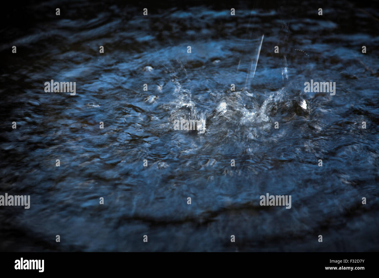 Water splashing into a pool Stock Photo - Alamy