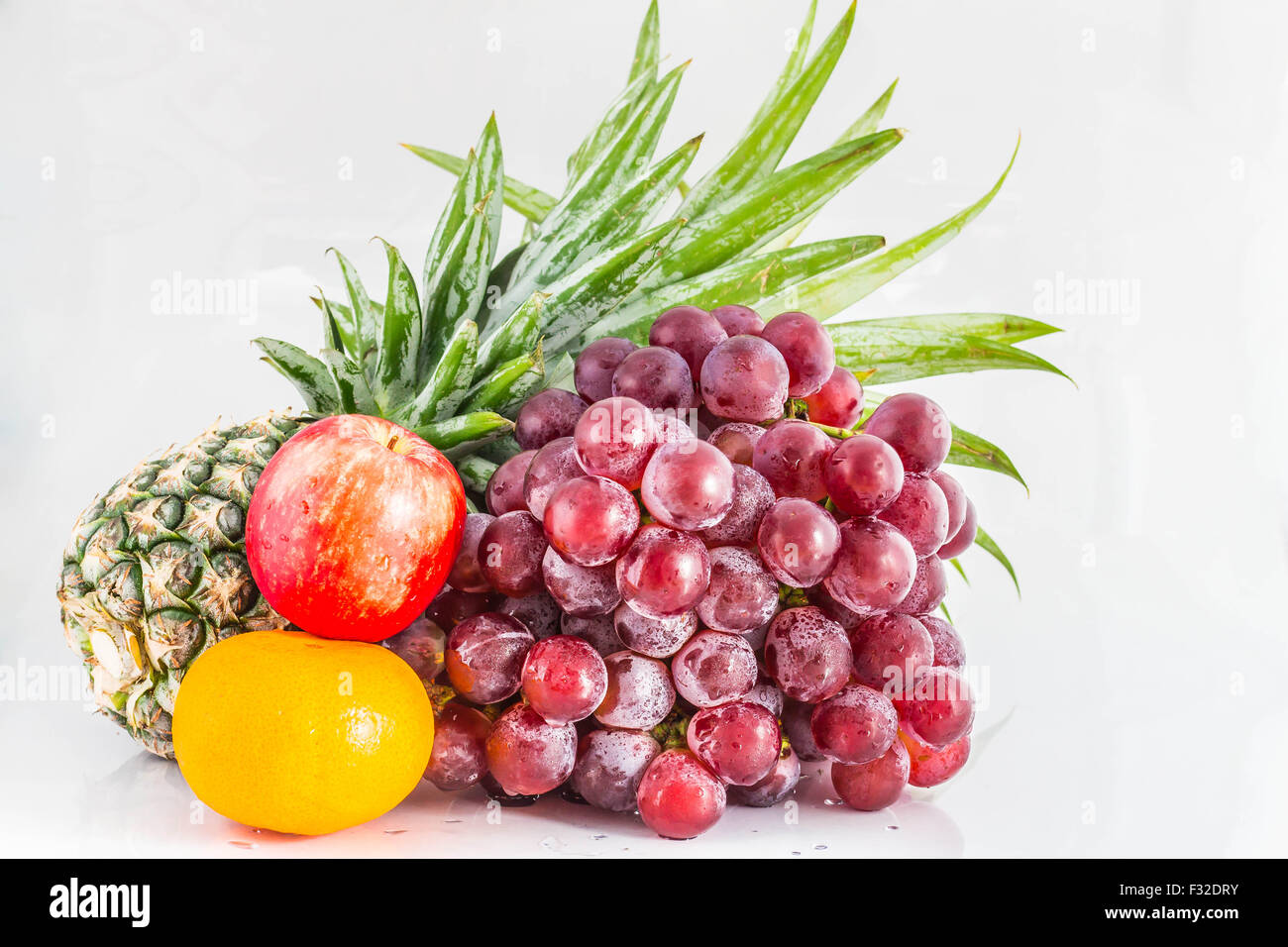 Grapes and fruits on isolated background Stock Photo - Alamy