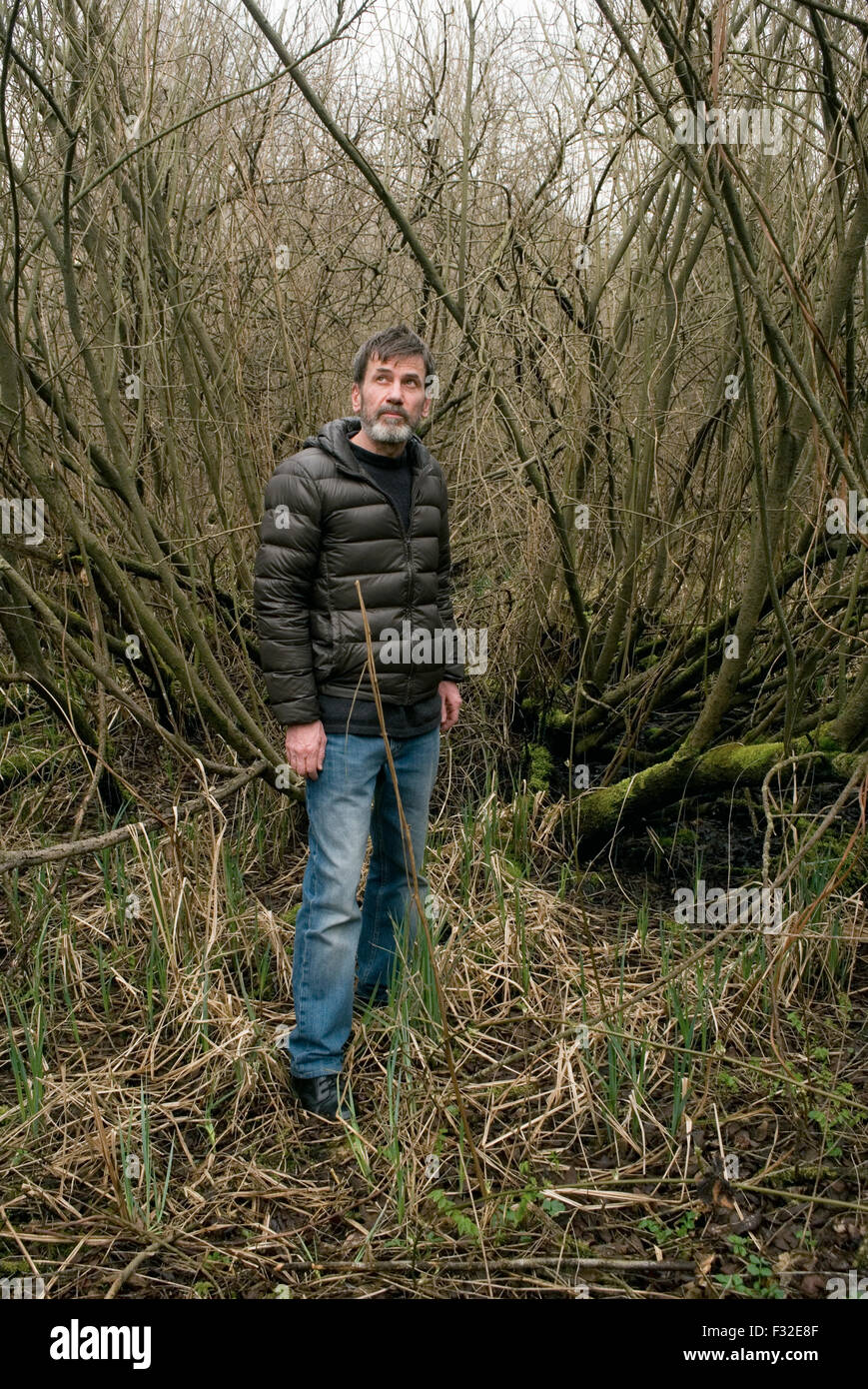 Man in the forest Stock Photo - Alamy