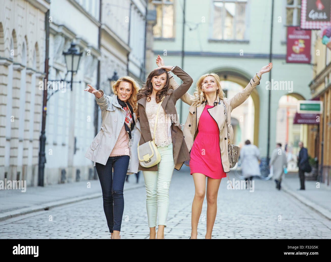 Cheerful young ladies during the walk Stock Photo - Alamy