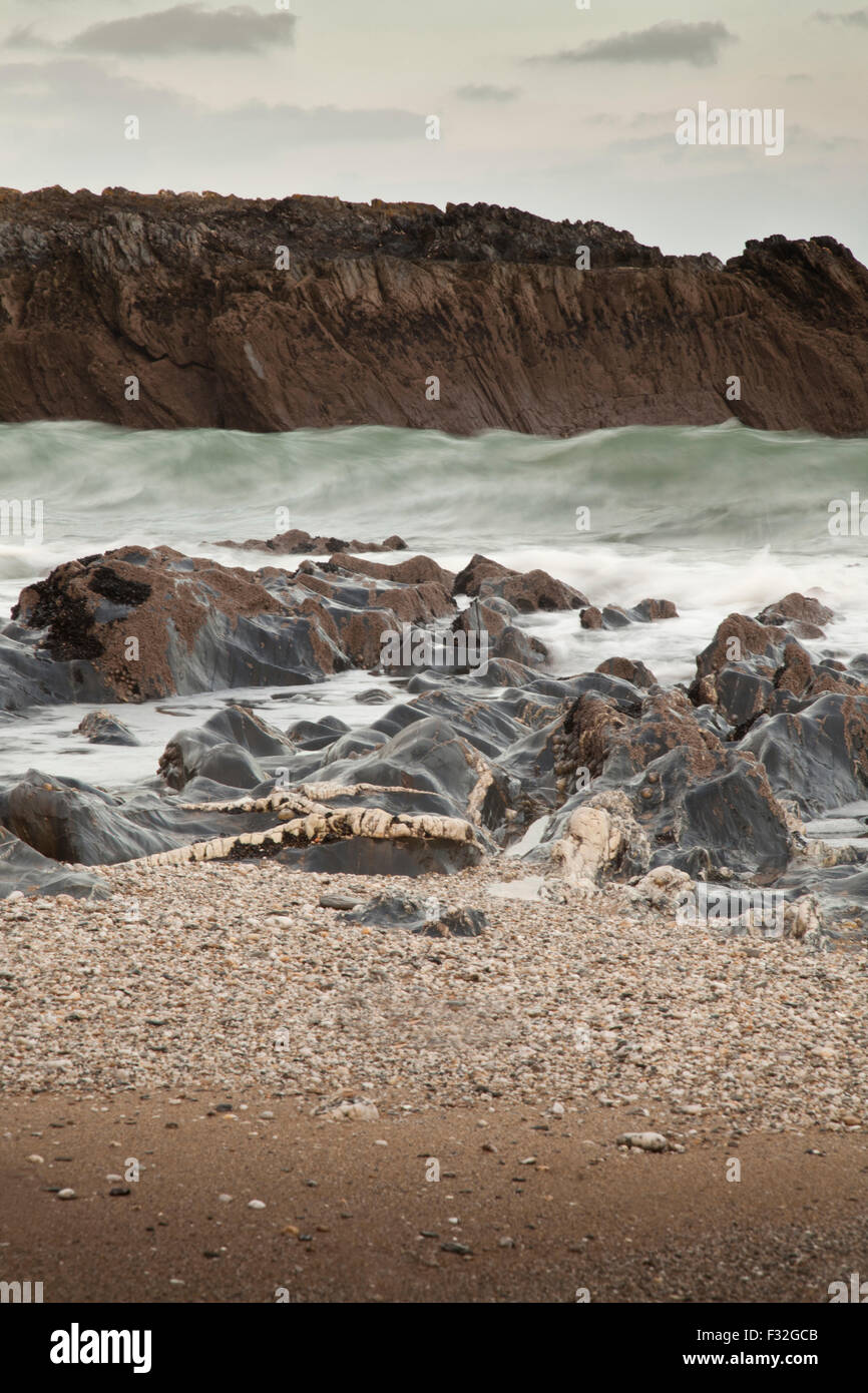 Sea washing over rocks Stock Photo - Alamy
