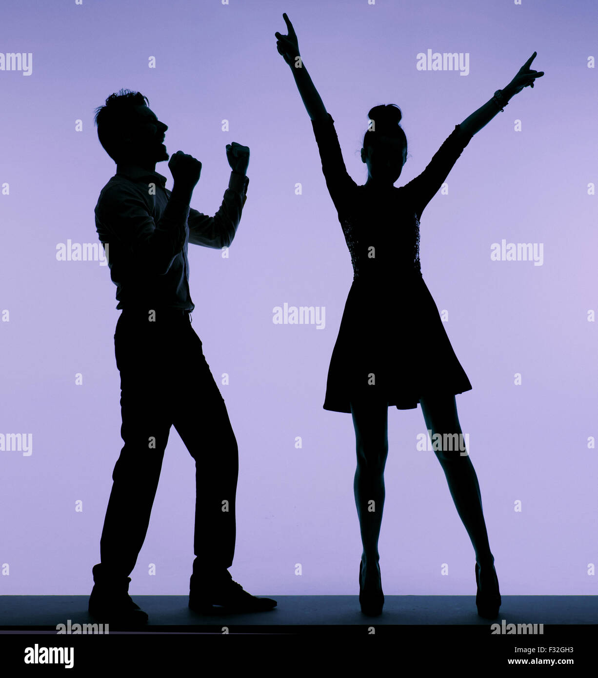 Joyful young people dancing together Stock Photo - Alamy