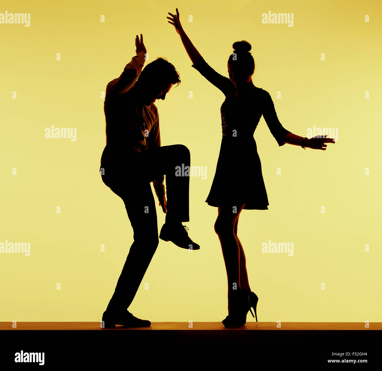 Young fit couple dancing at the night party Stock Photo - Alamy