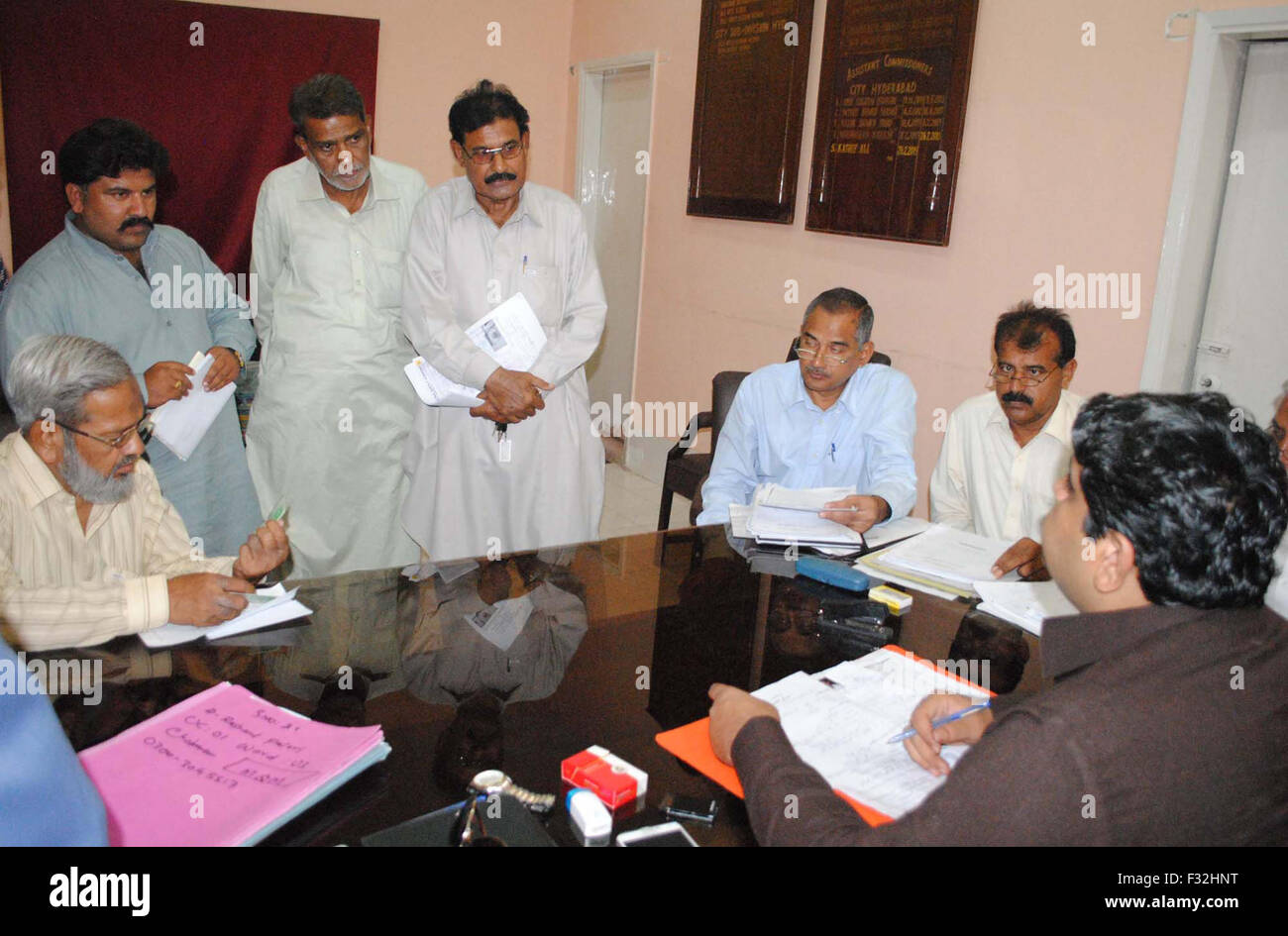 Regional Election Commission officer checking nomination papers of ...