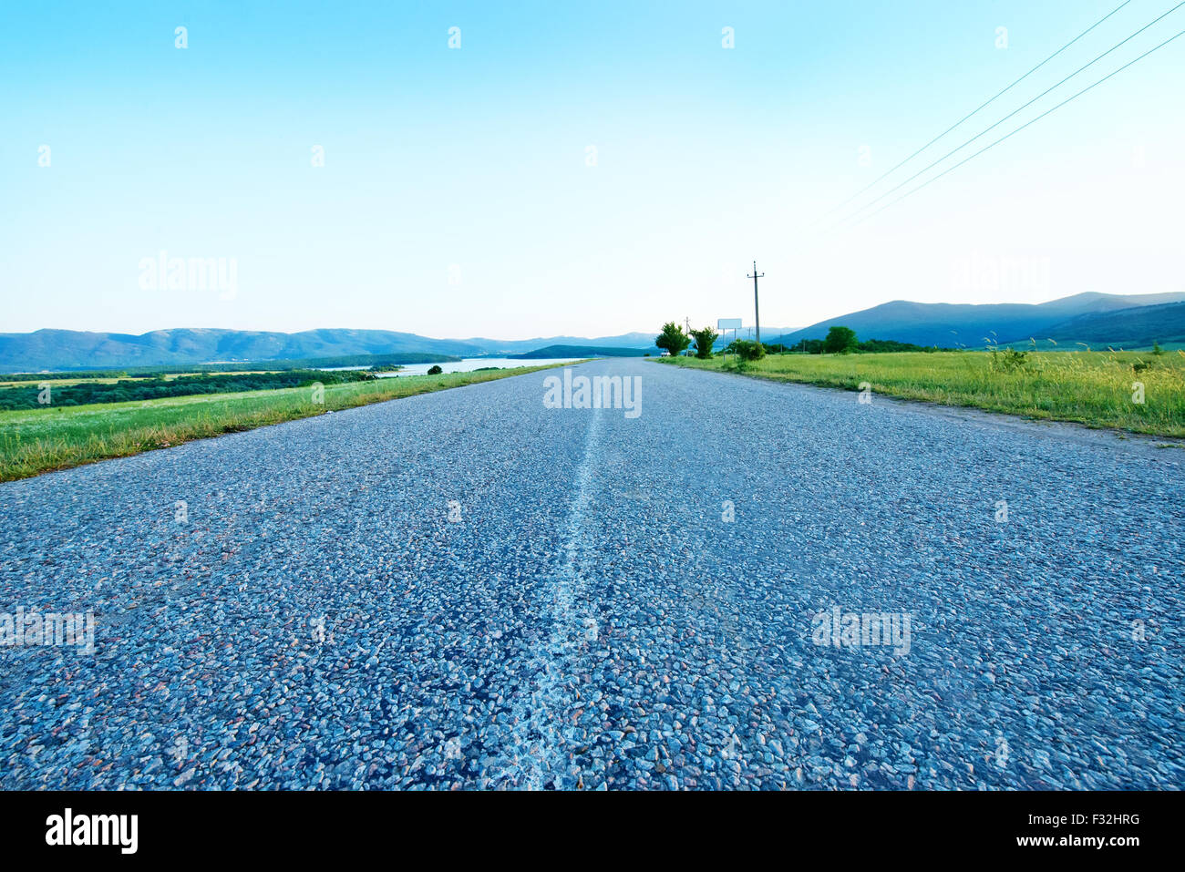 Road and blue sky in summer Crimea Stock Photo - Alamy