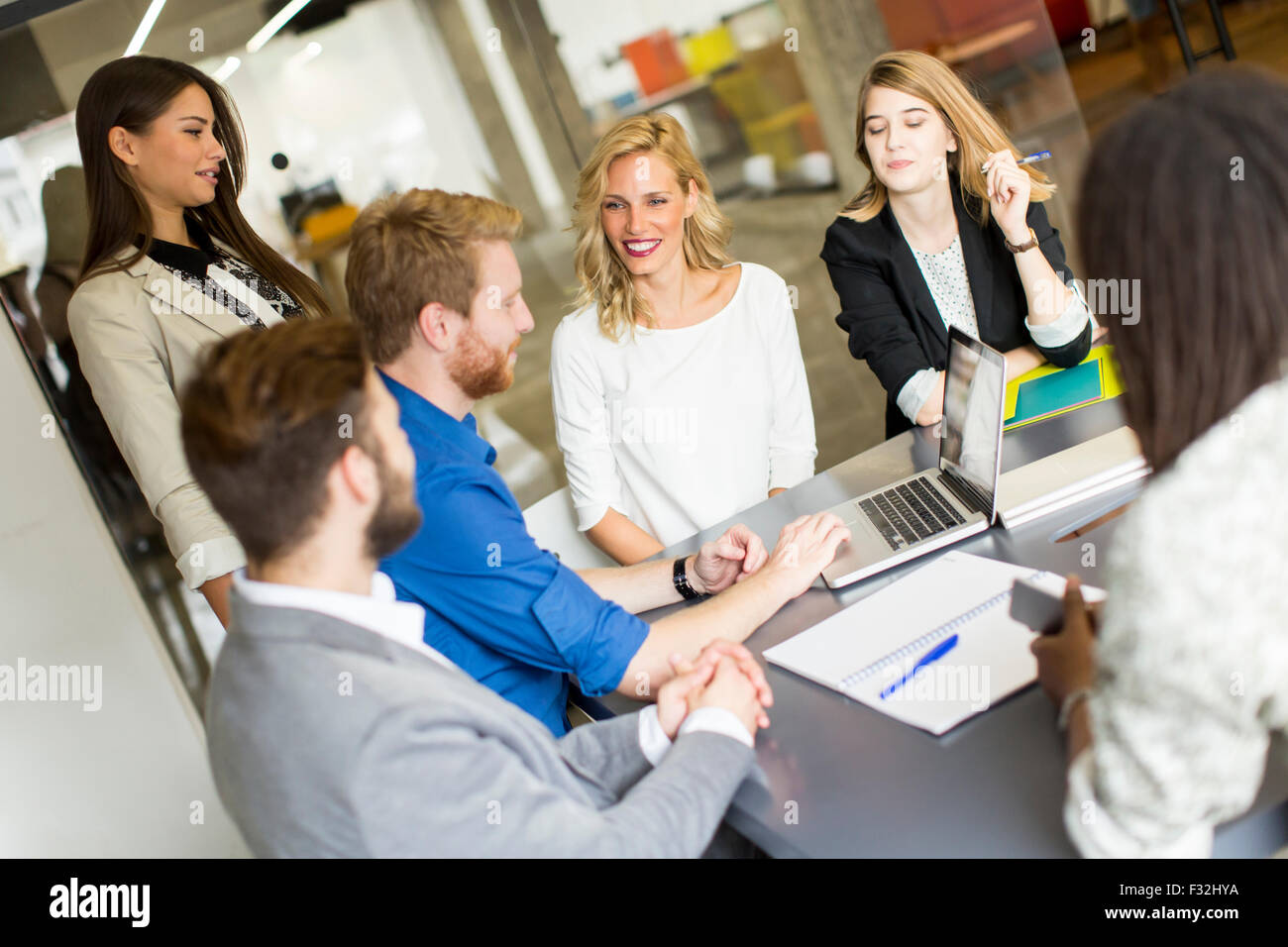 Young people in the office Stock Photo - Alamy